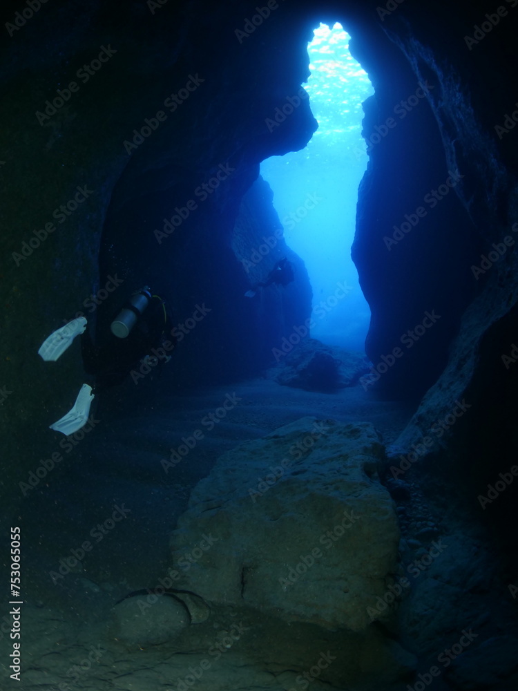 cave diving underwater scuba divers exploring caves and having fun ...