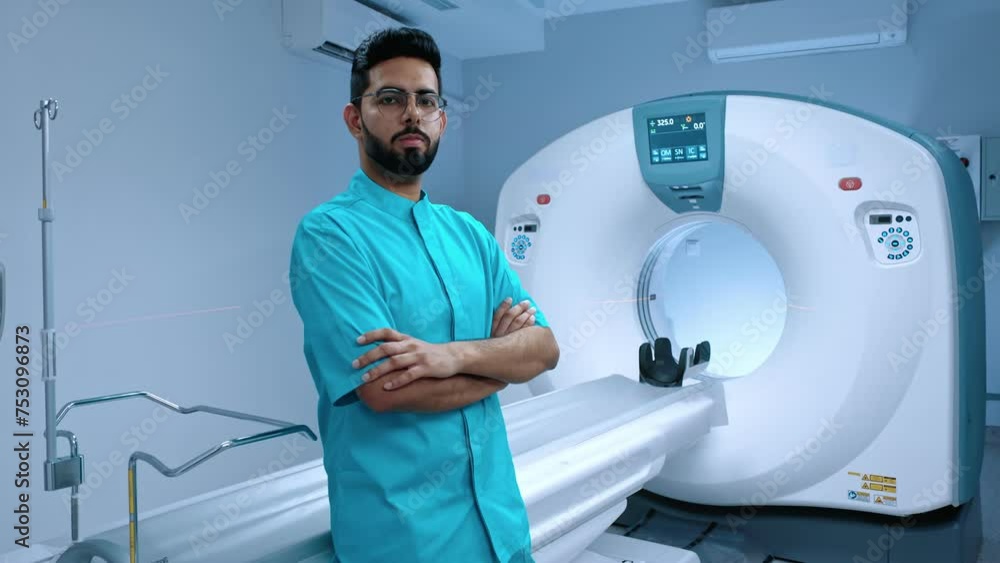 Indian tomography specialist posing with crossed arms. Confident doctor ...