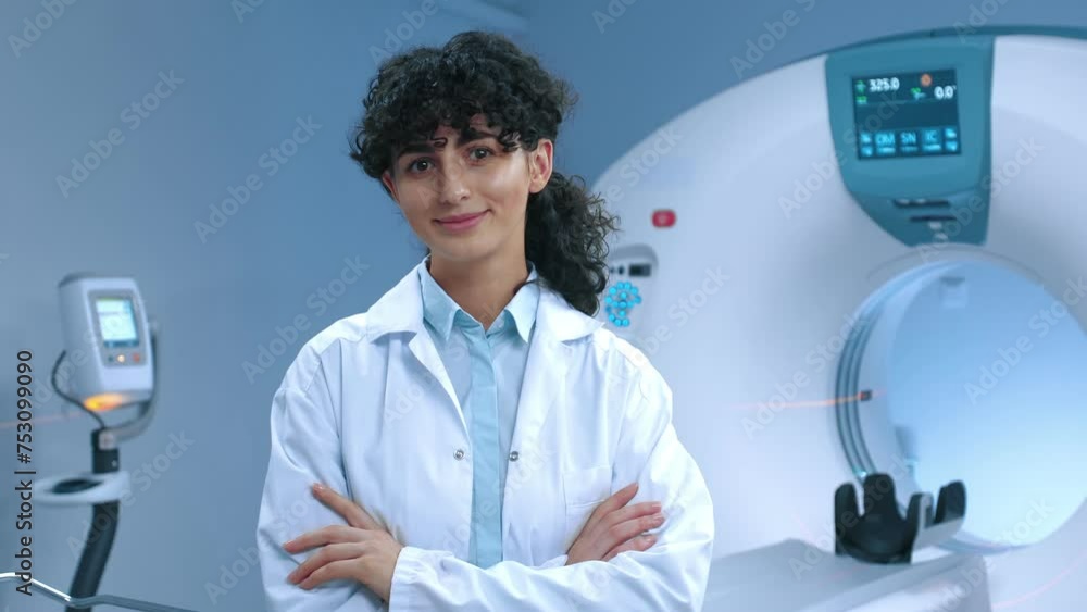 Caucasian tomography specialist posing with crossed arms. Smiling ...