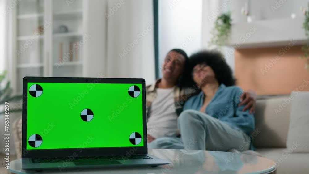 African American couple man woman hug relax at home couch girlfriend ...