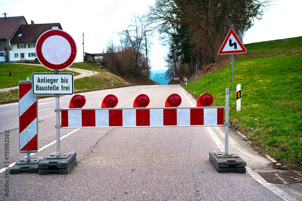 Poster Red and white work in progress sign of a barred road in ...