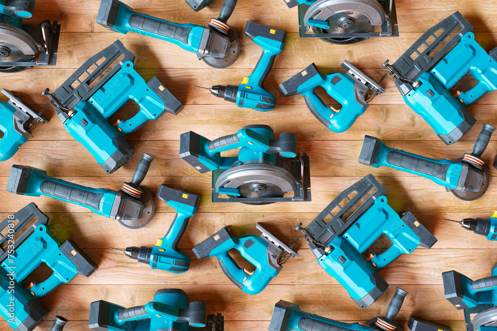 Comprehensive Set of Modern Cordless Power Tools Spread on Workbench ...