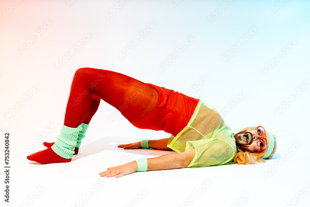 Drag Queen in Retro Sportswear Engages in Fitness Routine On The floor ...