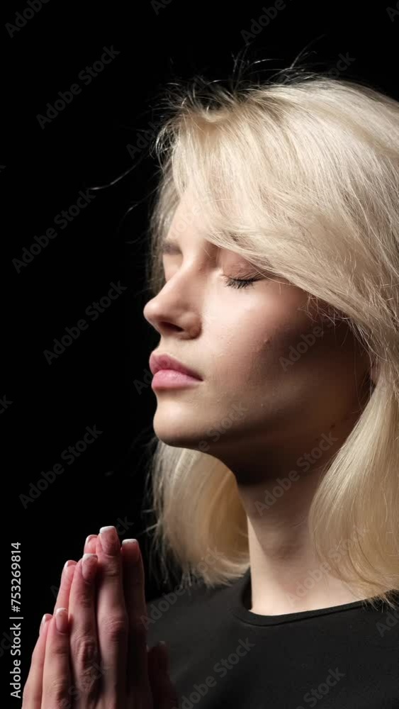 Video Stock Caucasian woman standing on black background, in ...