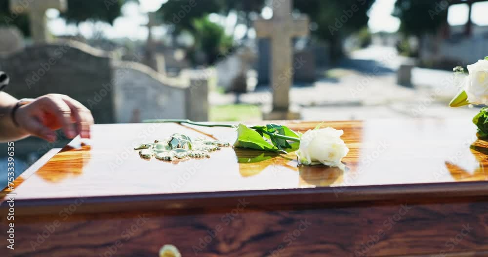 Flower, coffin and hands of person at graveyard for death ceremony ...