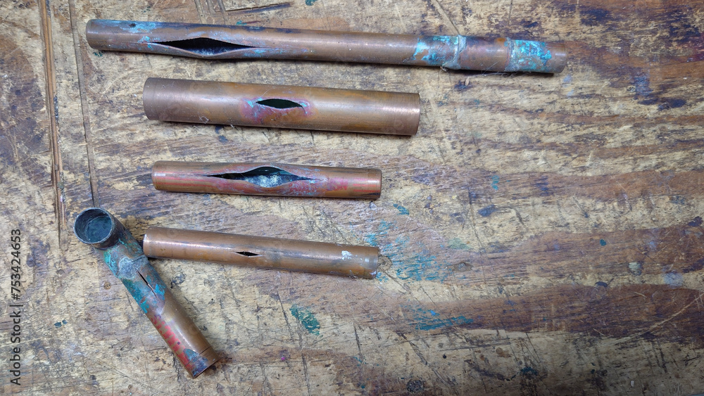 5 different copper pipe splits due to subfreezing temperature Stock ...