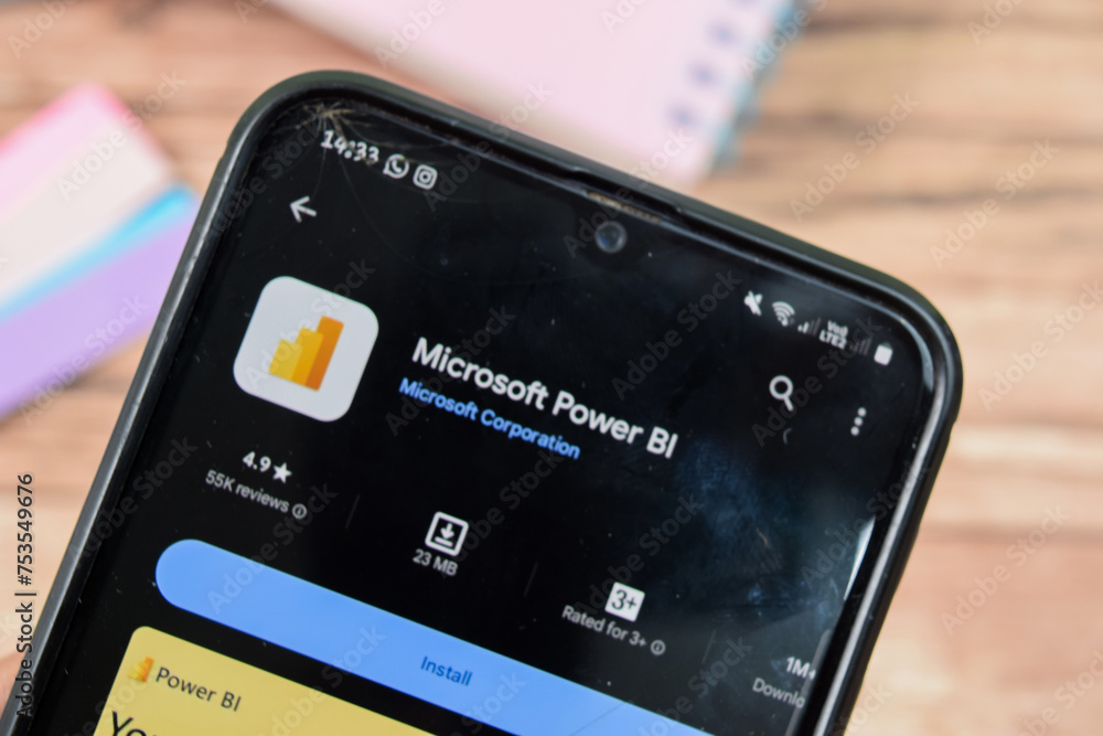 Microsoft Power BI application on Smartphone screen. Power BI is a ...