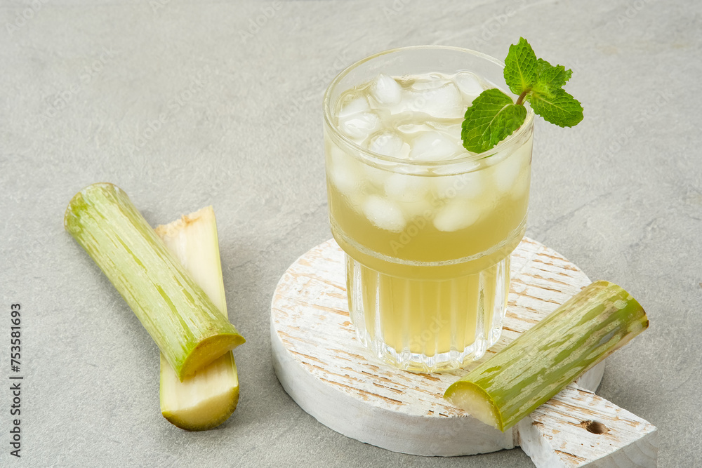 Fresh sugar cane juice (Es Tebu) in glass. Indonesian drink. Stock ...