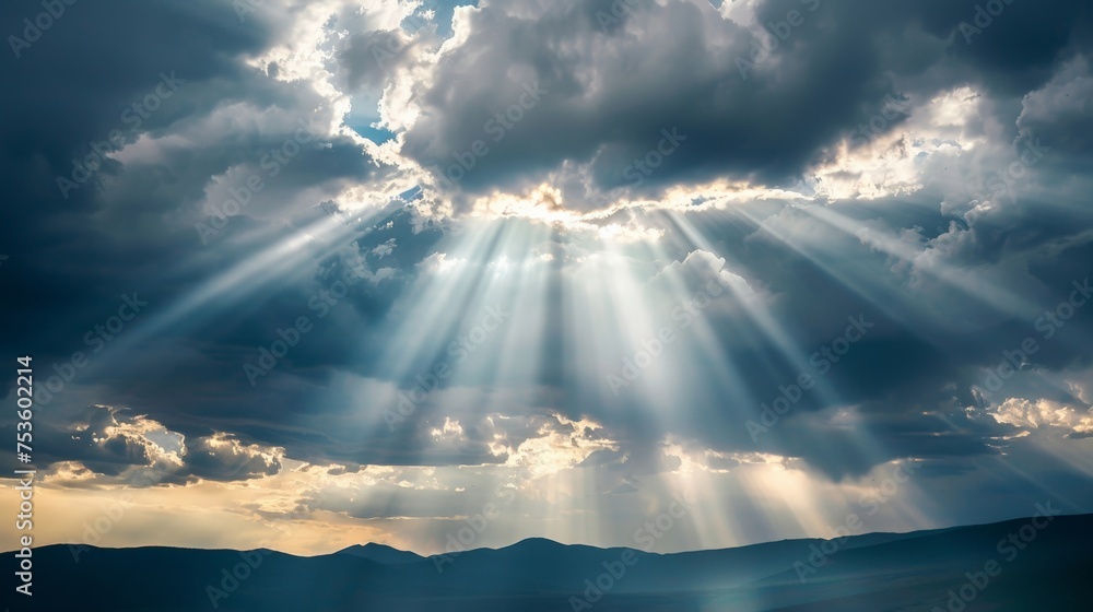 Rays of light shining through dark clouds It's gonna rain, dramatic sky ...