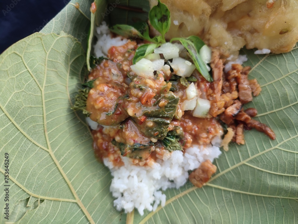 Nasi pecel or sega pecel is a typical Javanese Indonesian rice dish ...
