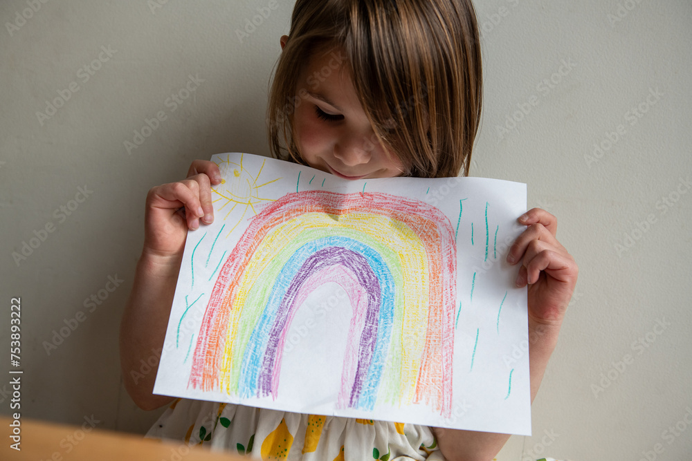 Child Shows a Rainbow Drawing She Colored with Crayons Stock Photo ...