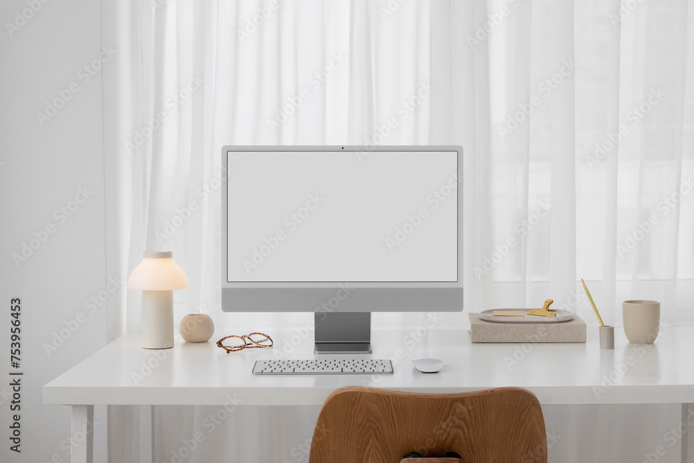 Mockup of a modern computer with white screen in a stylish office Stock ...