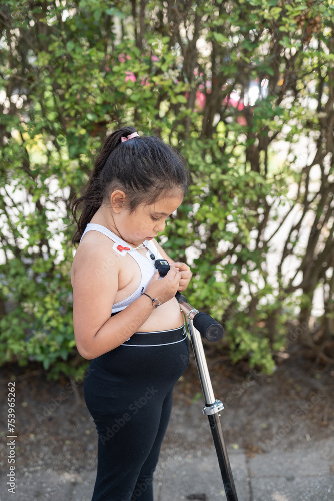 Little girl touching her mobile holter cardio monitor Stock Photo ...