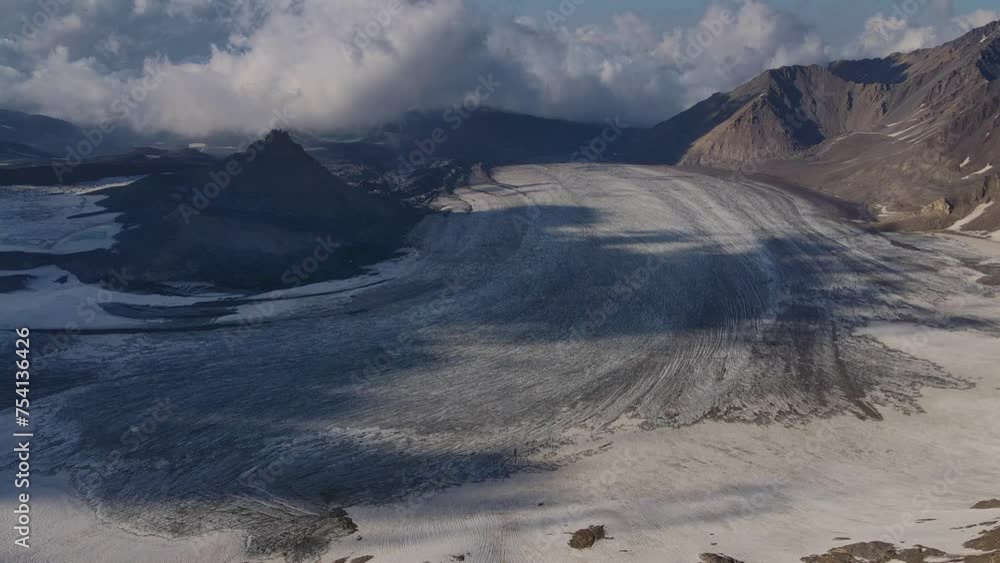 Aerial view glacier carves through mountains Earth's masterpiece ...