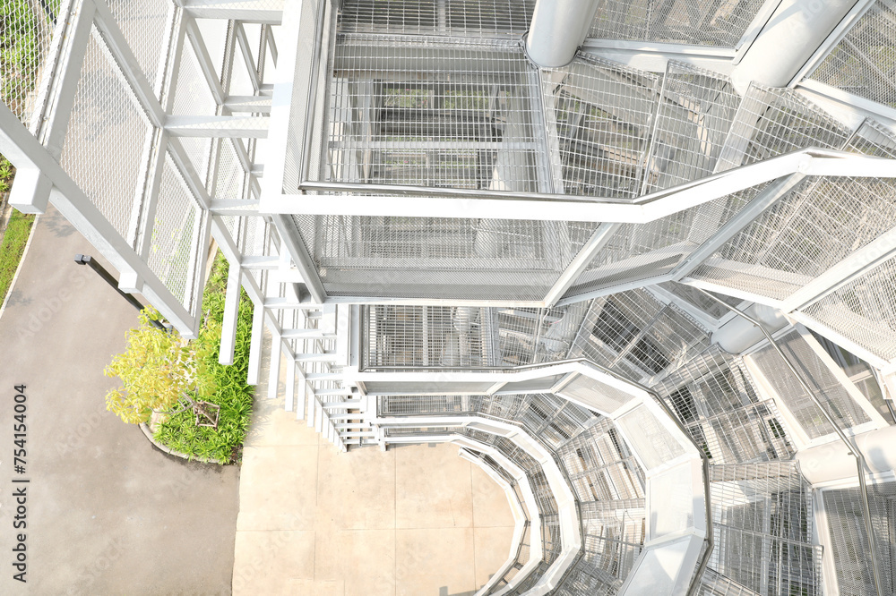 White steel frame structure with surrounding walls are lined with steel ...