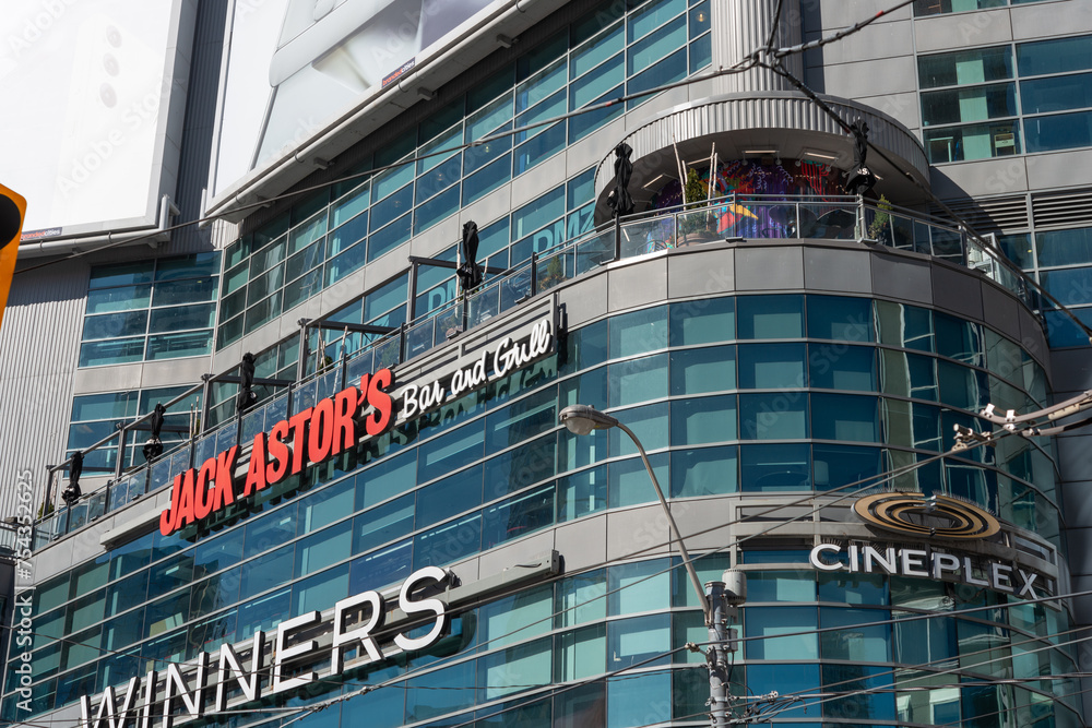 exterior of The Tenor, a multi-use shopping mall, with signs for Jack ...