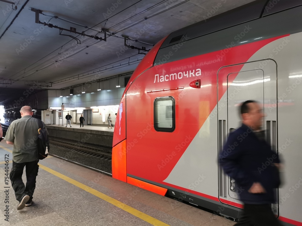 MOSCOW, RUSSIA - JUNE 15, 2023: Train Lastochka at undeground station ...