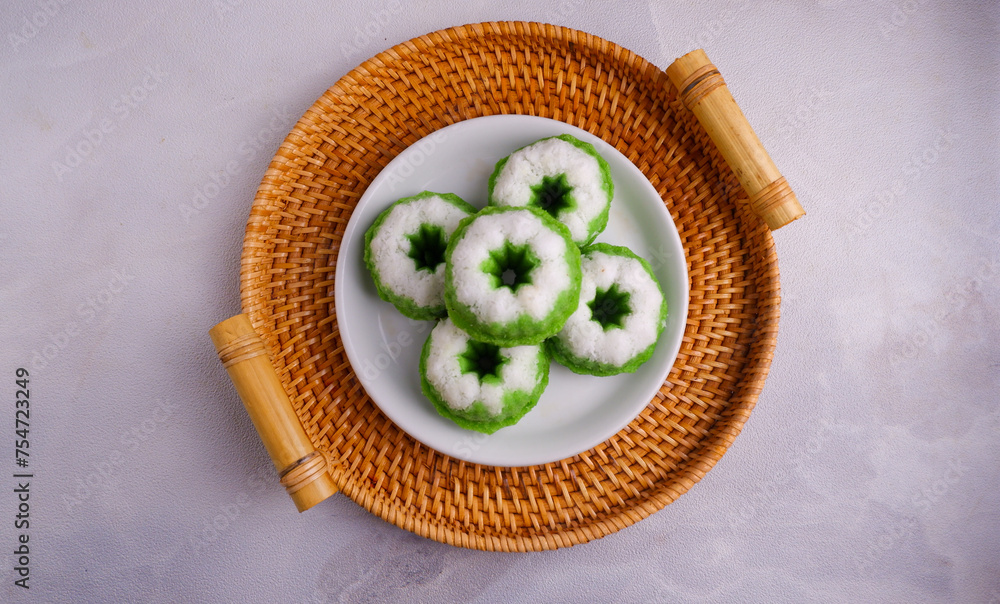 Kue Putu Ayu is one of the traditional wet cakes that have a soft ...