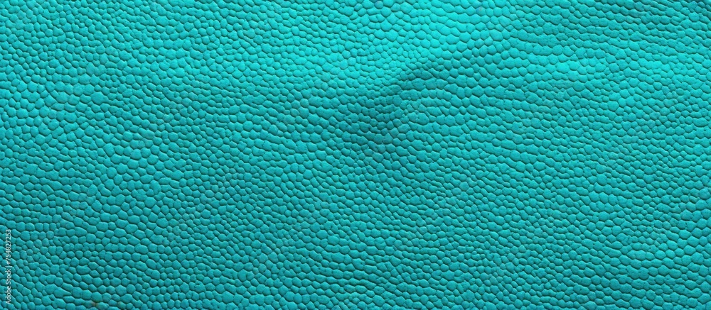 This close-up depicts the intricate details of a blue leather texture ...