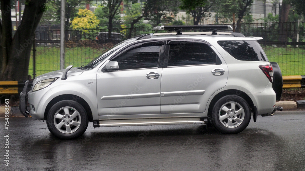 black color car, Daihatsu Terios car, drive in rainy day, at TB ...