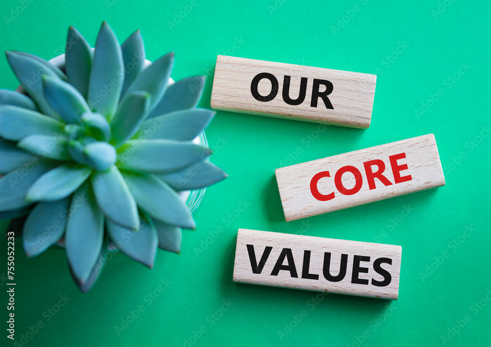 Our core values symbol. Concept words Our core values on wooden blocks ...