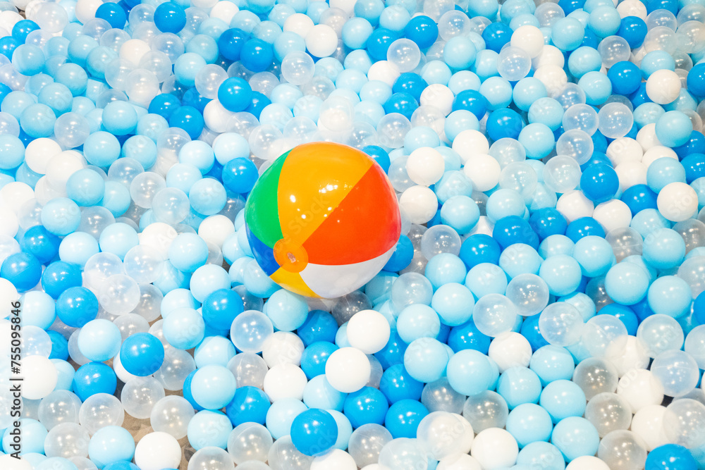 Colored plastic balls in pool of kindergarten school,White and blue ...