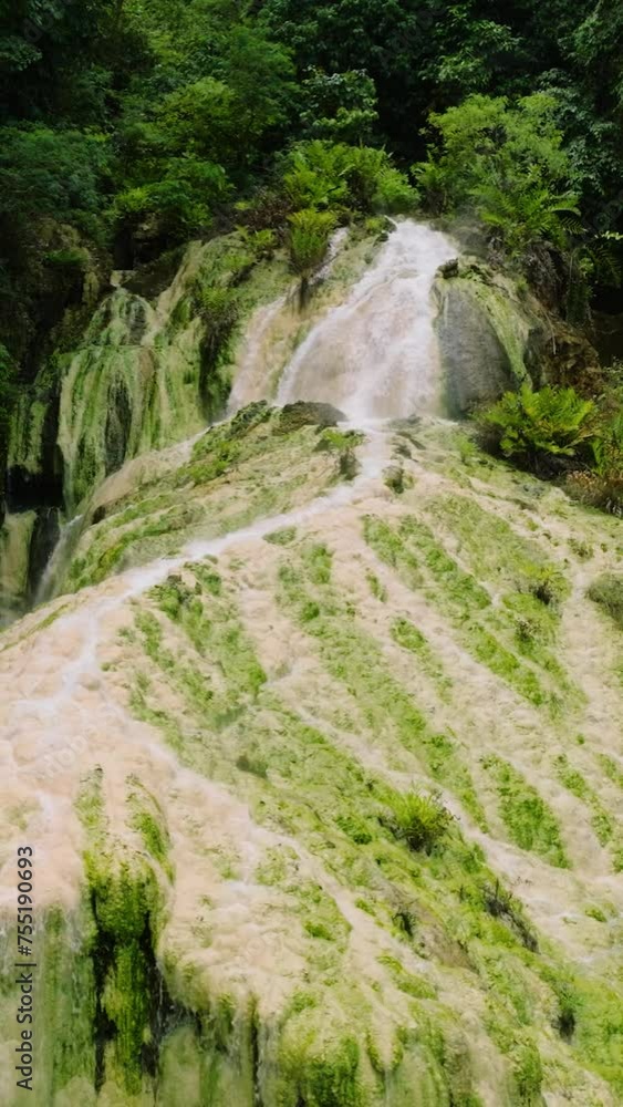 Bilawa Mainit Hot Spring in the rainforest. Falls in the tropical ...