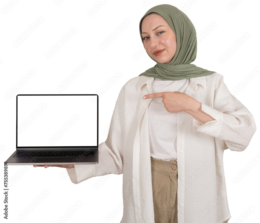 Presenting laptop, portrait of excited caucasian muslim girl in hijab ...