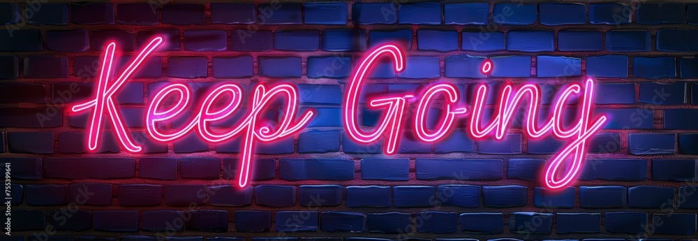 Keep Going in neon lettering, mounted on a rustic brick wall background ...