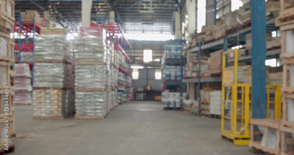 Blurred Background Commercial packaging on steel rack. Aisle in ...