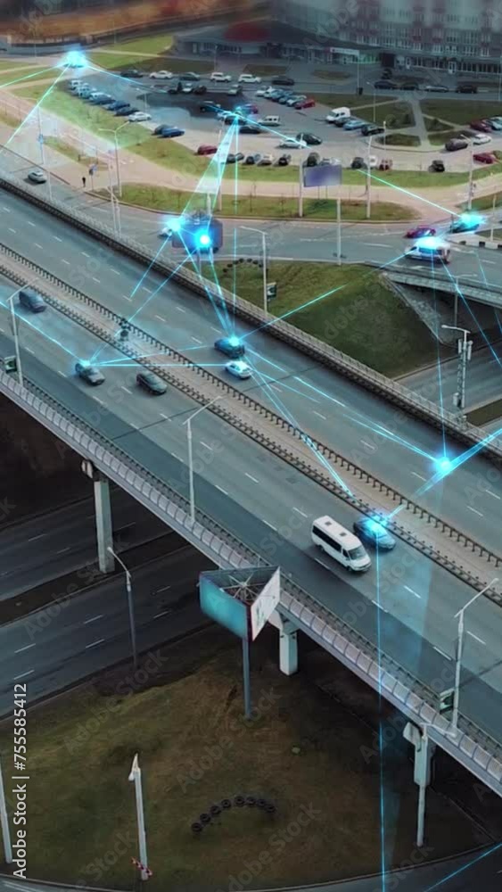 Self-driving autonomous cars move along a suburban traffic intersection ...