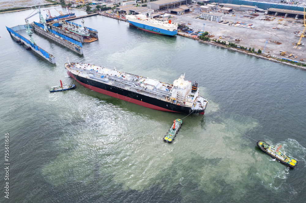 Aerial view of a shipyard repairing a large ship maintenance or repair ...