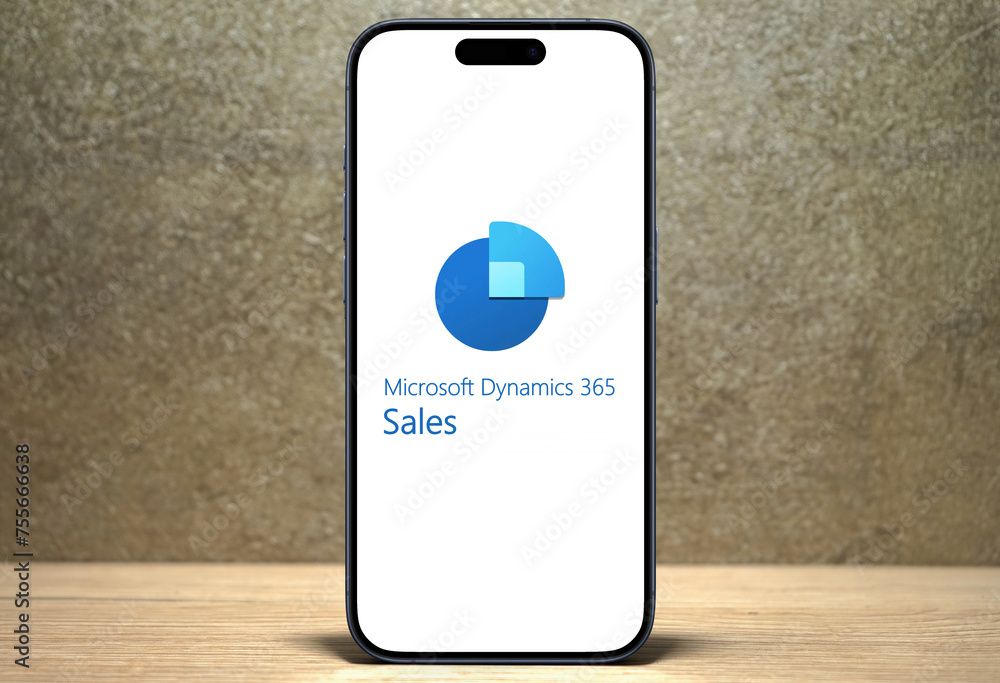 Microsoft Dynamics 365 Sales Logo is displayed on a modern smartphone ...