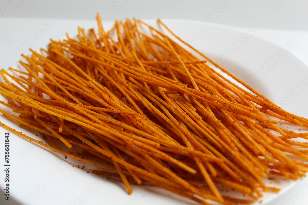 Mie lidi pedas, traditional snack from Indonesia. Noodle-like texture ...