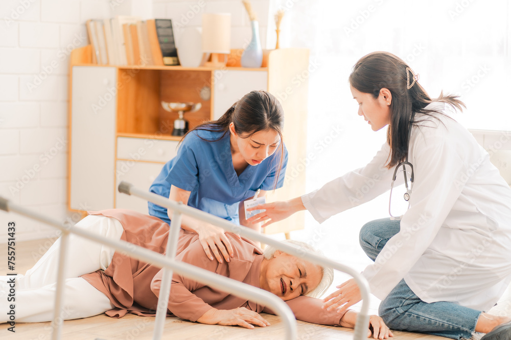 senior patient falling on the ground floor at home, Asian caregiver ...