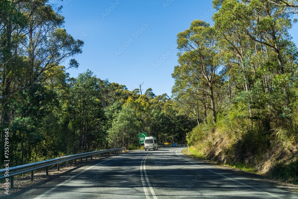 tourist traveling in a caravan exploring nature driving on a raod in ...