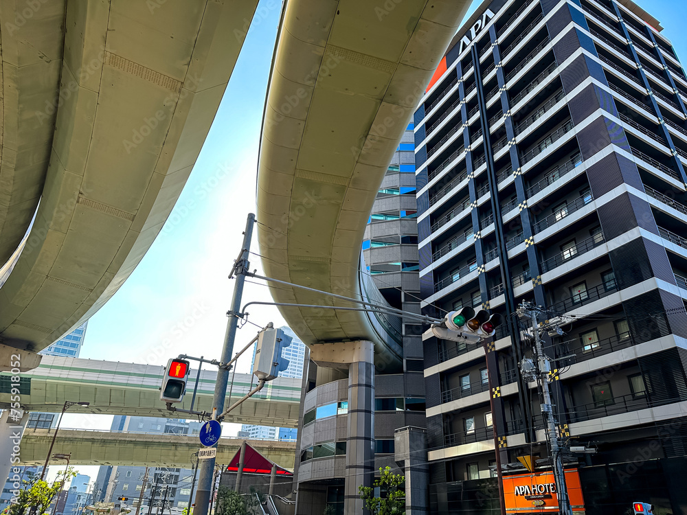Osaka, Japan - 15.11.2023. Road goes through Gate Tower Building in ...