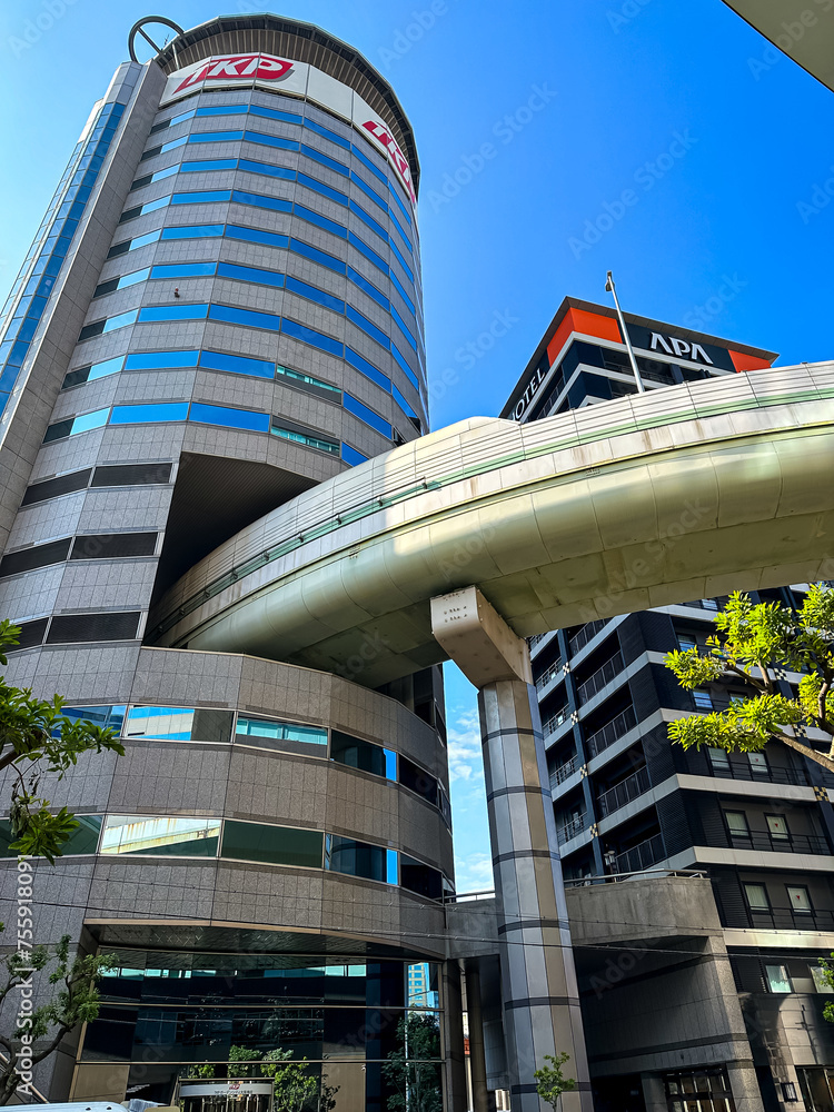 Osaka, Japan - 15.11.2023. Road goes through Gate Tower Building in ...