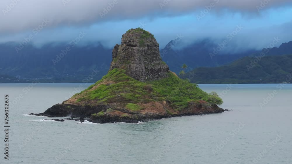 Mokolii volcanic island landmark site. Oahu island tourism background ...