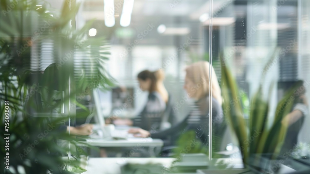 Busy Office Scene. Blurred modern office space with employees working ...