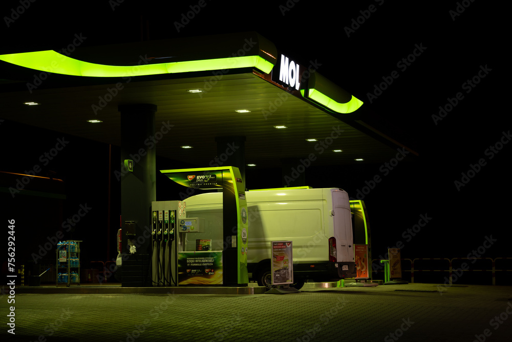 MOL gas station with logo sign. Hungarian oil company filling petrol ...
