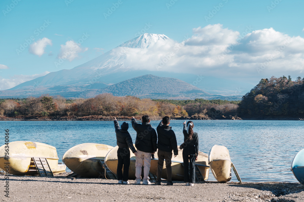 tourists enjoy with Fuji Mountain at Lake Shoji, happy friends group ...