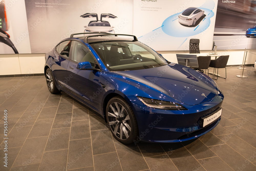 blue Tesla electric car model 3 in Studio, autopilot and eco-friendly ...