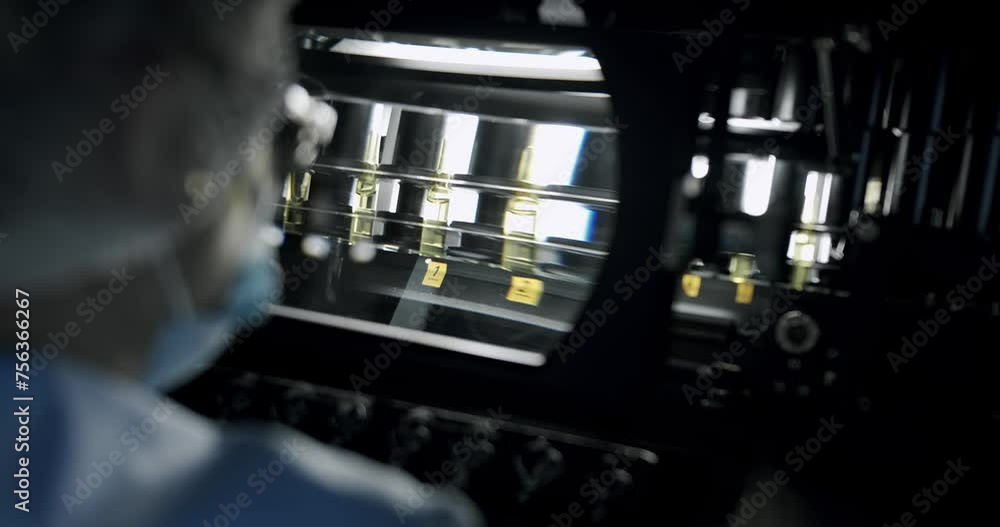 Women Inspects Ampoules For Particulates In Liquid And Container ...