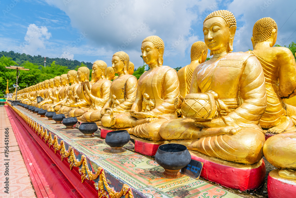 Buddha statues and Buddhist disciples at Phuttha Utthayan Makha Bucha ...