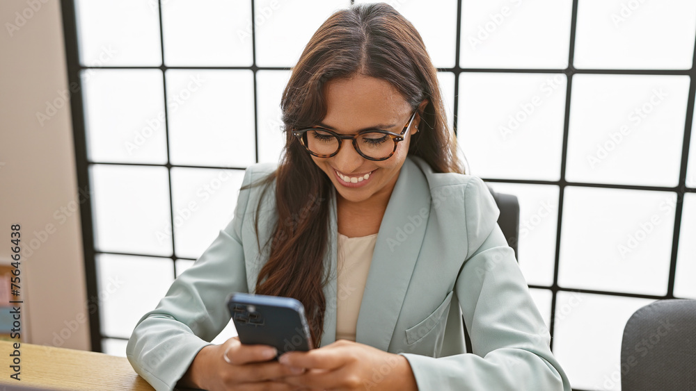 Confident young hispanic woman, successful business worker, enjoys her ...