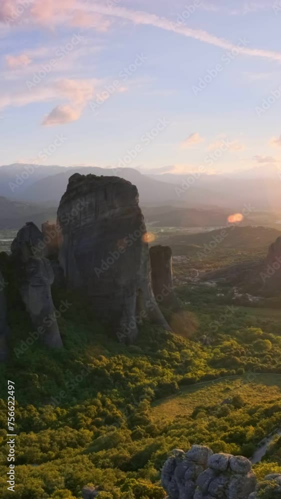 Sunset over monastery of Rousanou and Monastery of St. Nicholas ...