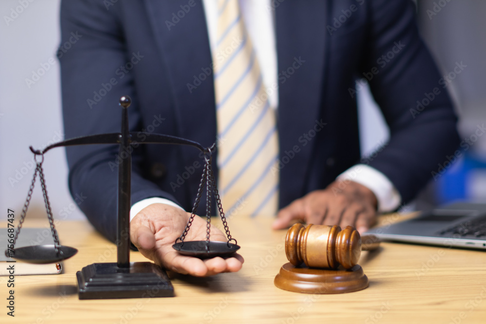 Brass scales are placed on lawyers desks in legal advice offices as a ...