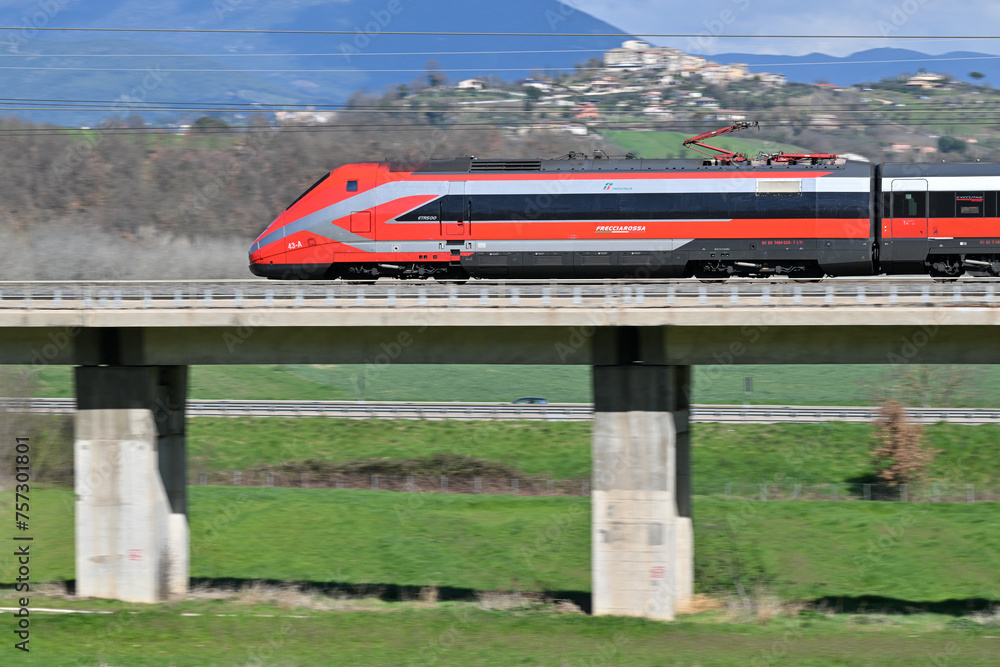 Frecciarossa high speed train running on the tracks in Italy Stock ...