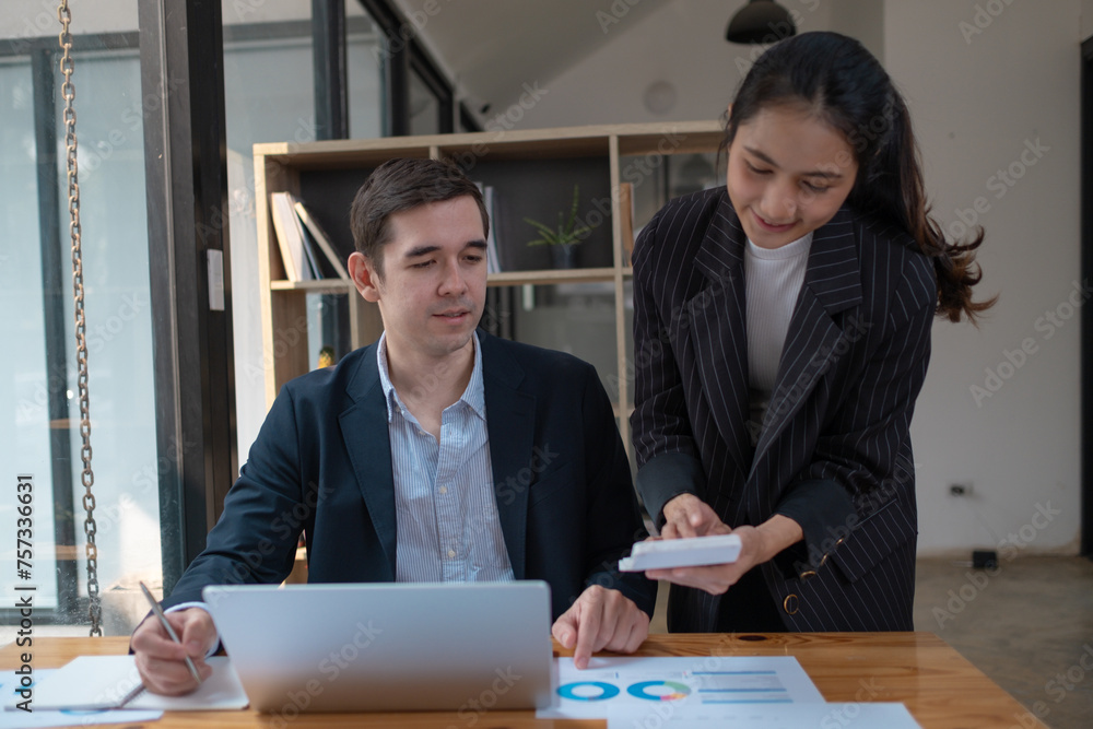 Mature executive helping new employee, Mentor, manager and teamwork ...